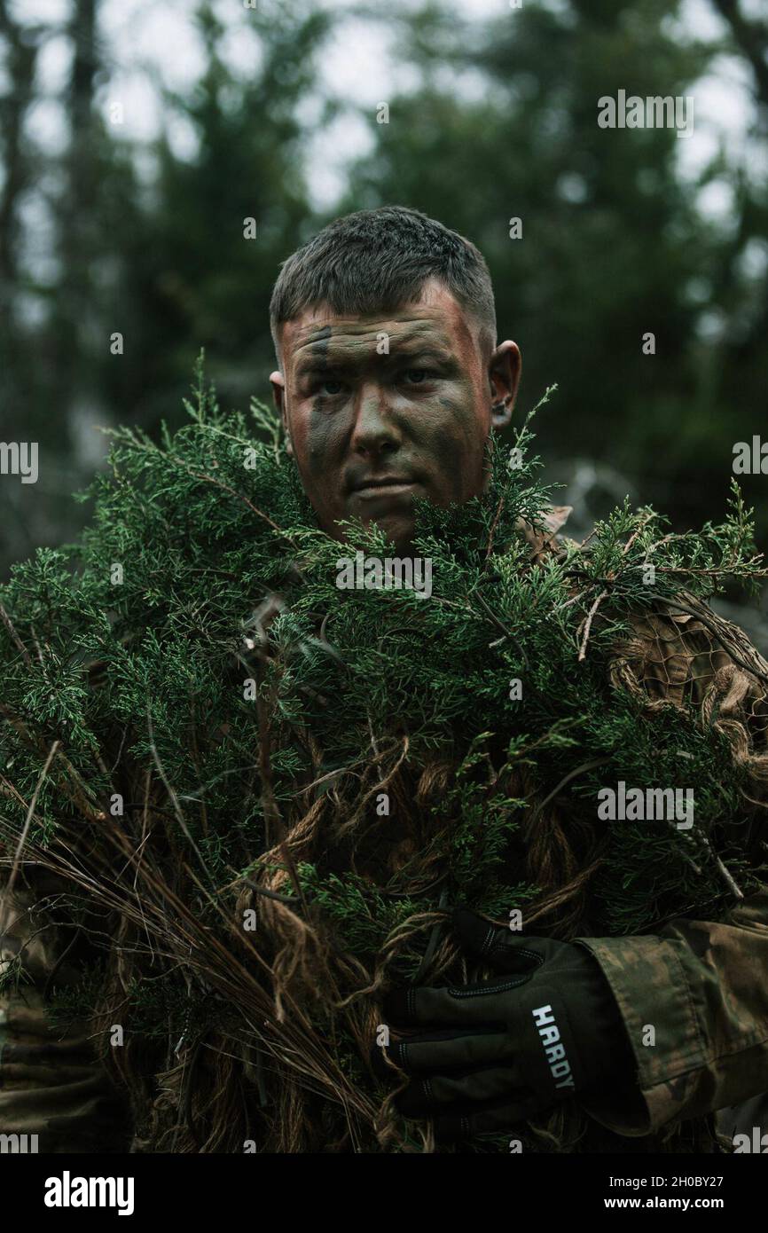 Spc. Jarrod Thomas, a Sniper with 1st Battalion, 12th Cavalry Regiment ...