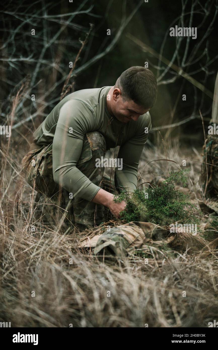 Spc. Jarrod Thomas, a Sniper with 1st Battalion, 12th Cavalry Regiment ...