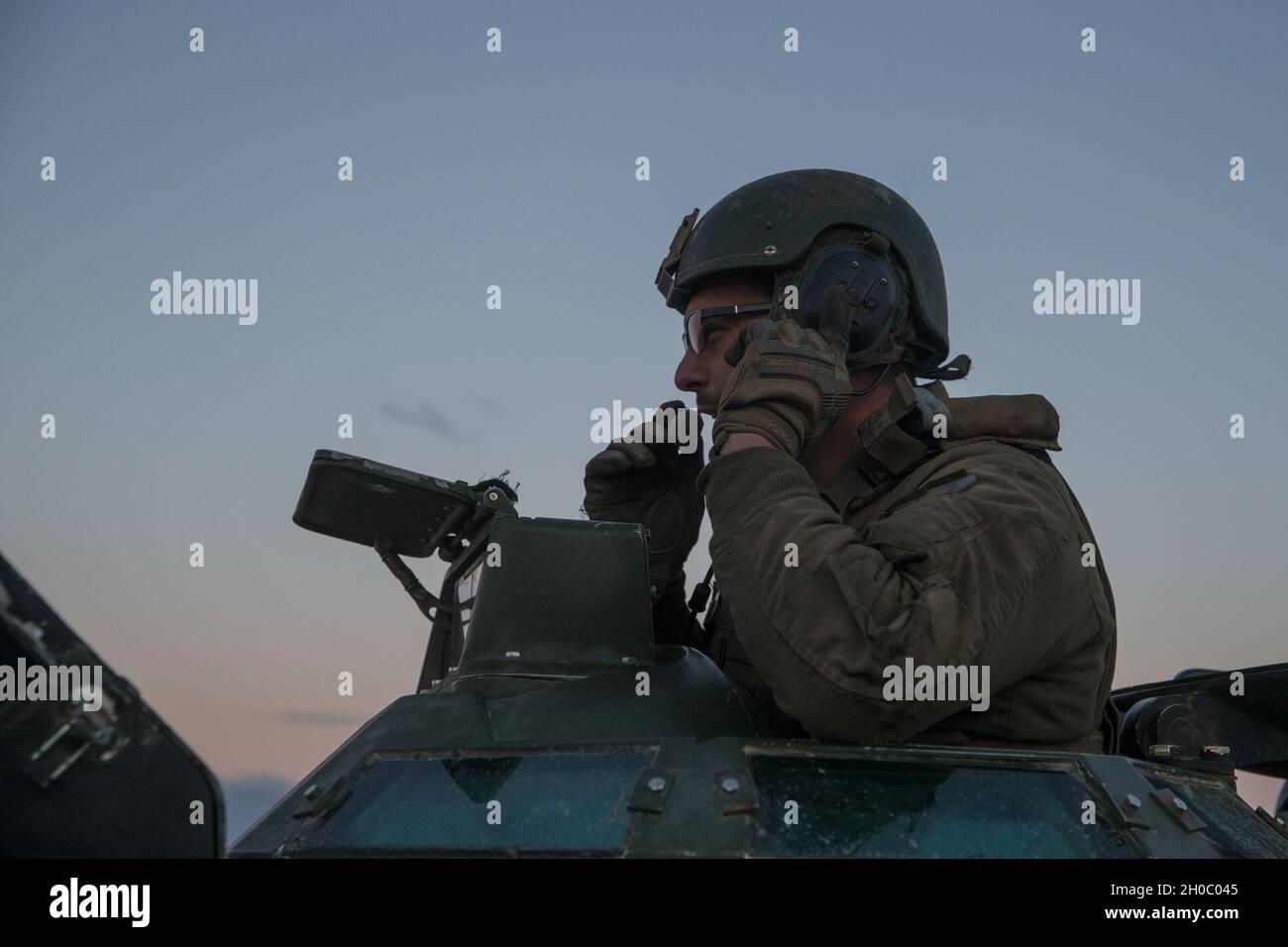 U.S. Marine Corps Lance Cpl. Michael Sandoval, an assault amphibious ...