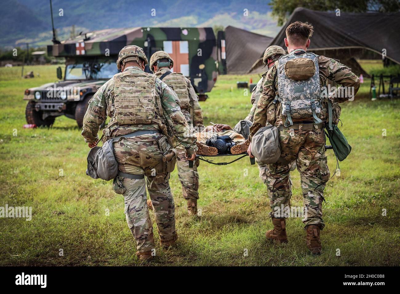 Combat medics of the 25th Infantry Division conduct emergency patient ...