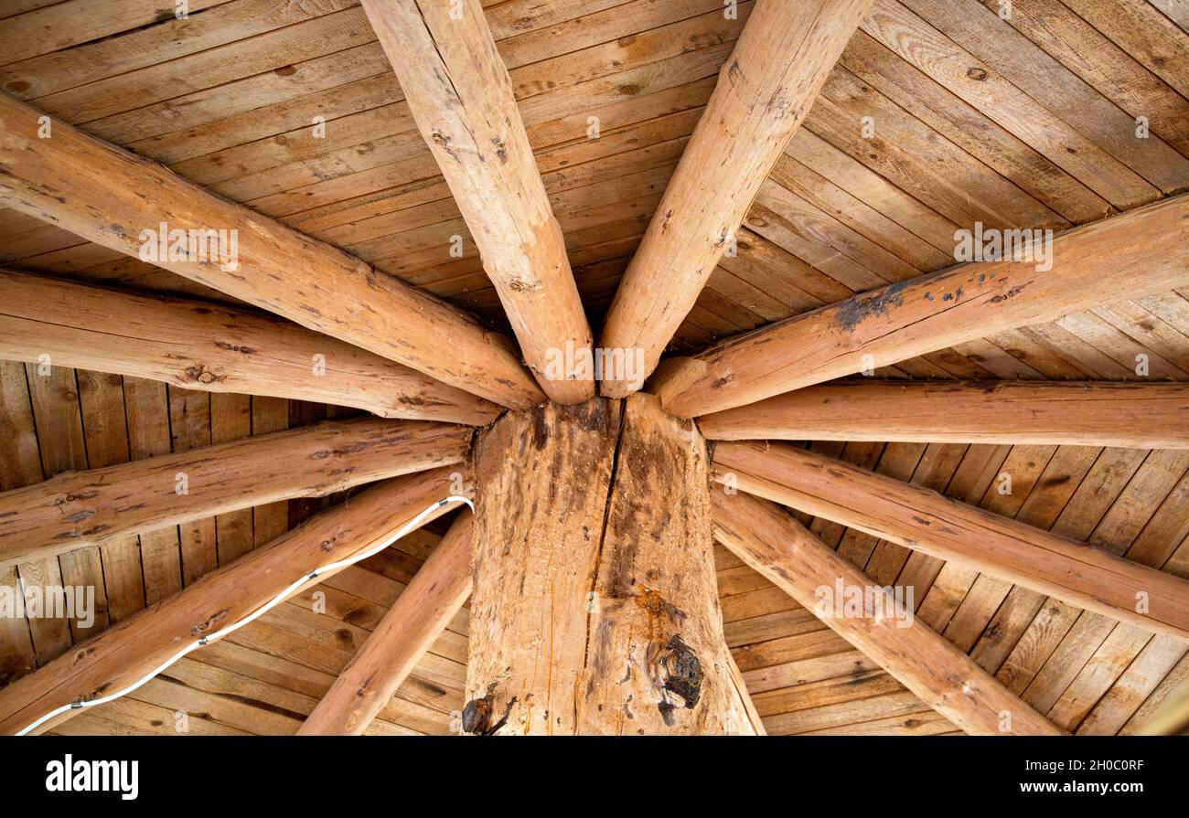 Wooden roof vault with large logs in a wooden house, architecture Stock ...