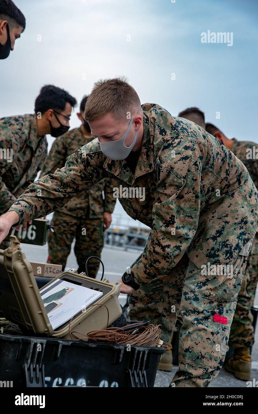 U.S. Marine Corps Cpl. Ashton Bailey, a landing support specialist with ...