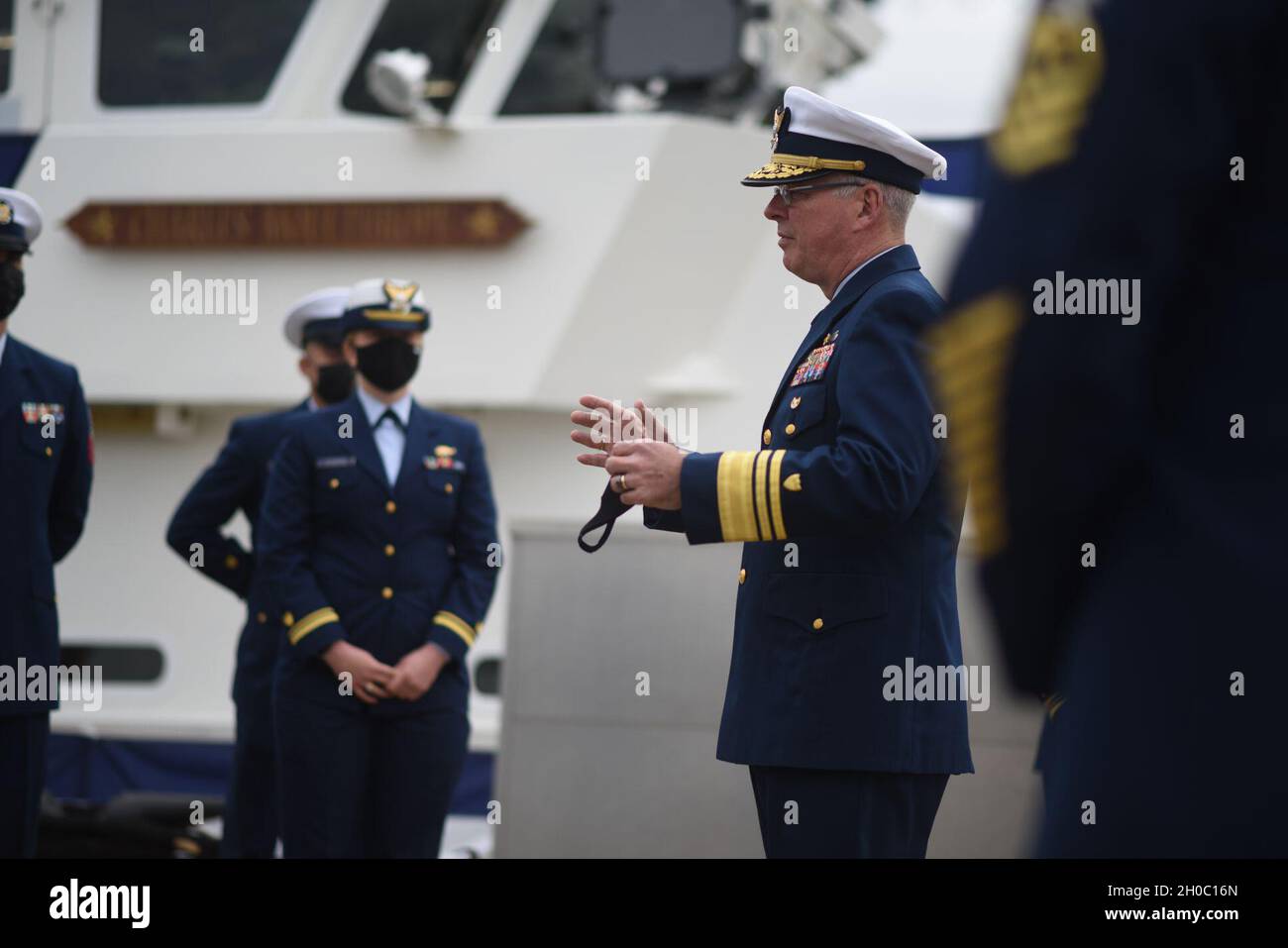 Vice Adm. Steven Poulin, commander of the Coast Guard Atlantic Area, speaks to the USCGC Charles ...