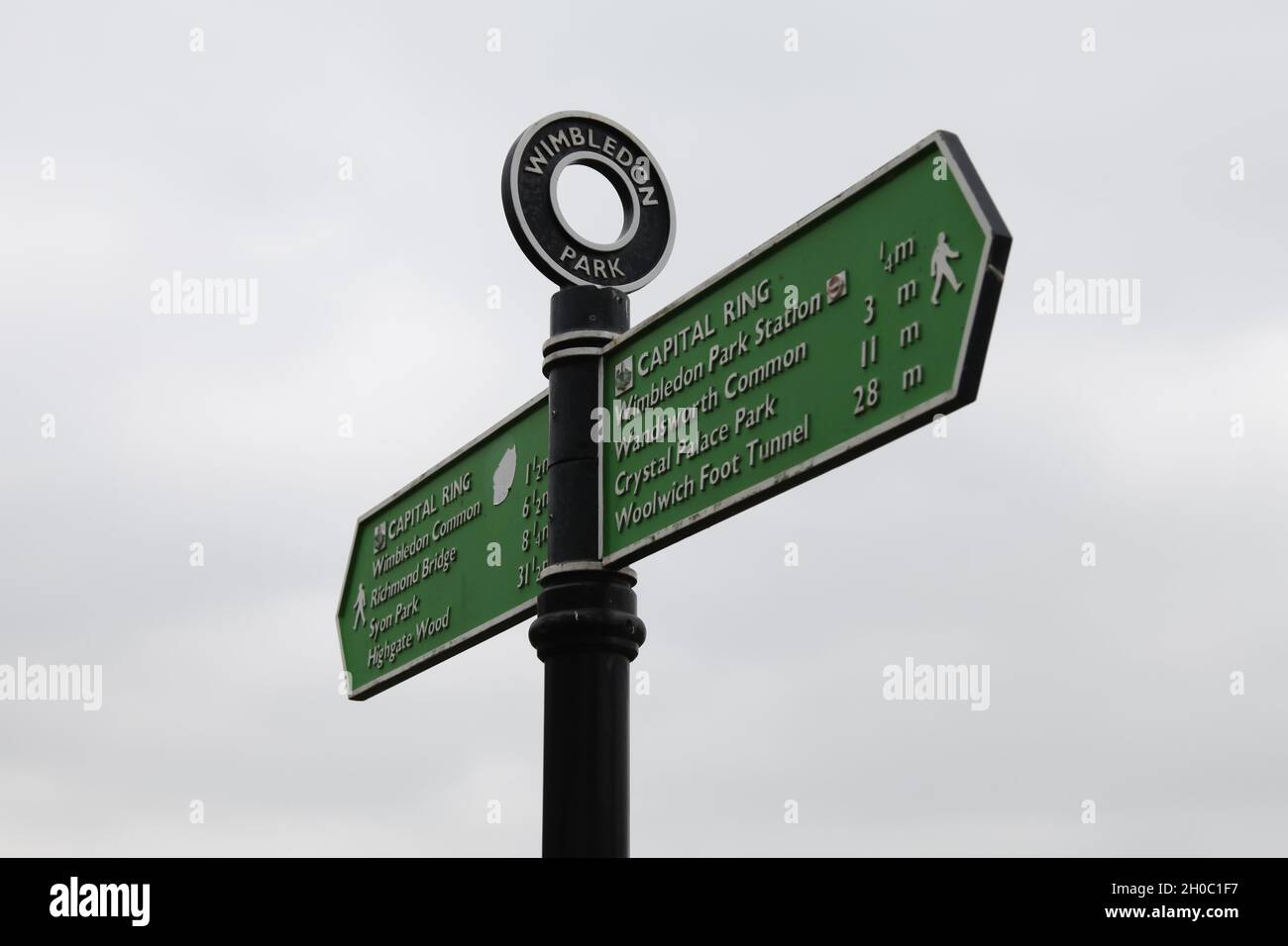 Wimbledon Park sign post against sky, Borough of Merton, London ...