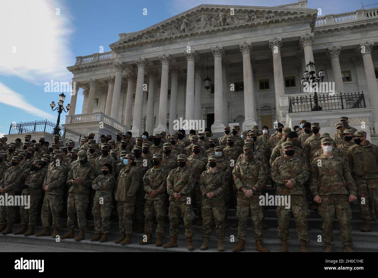 Illinois National Guard members gather on steps of the senate chamber ...
