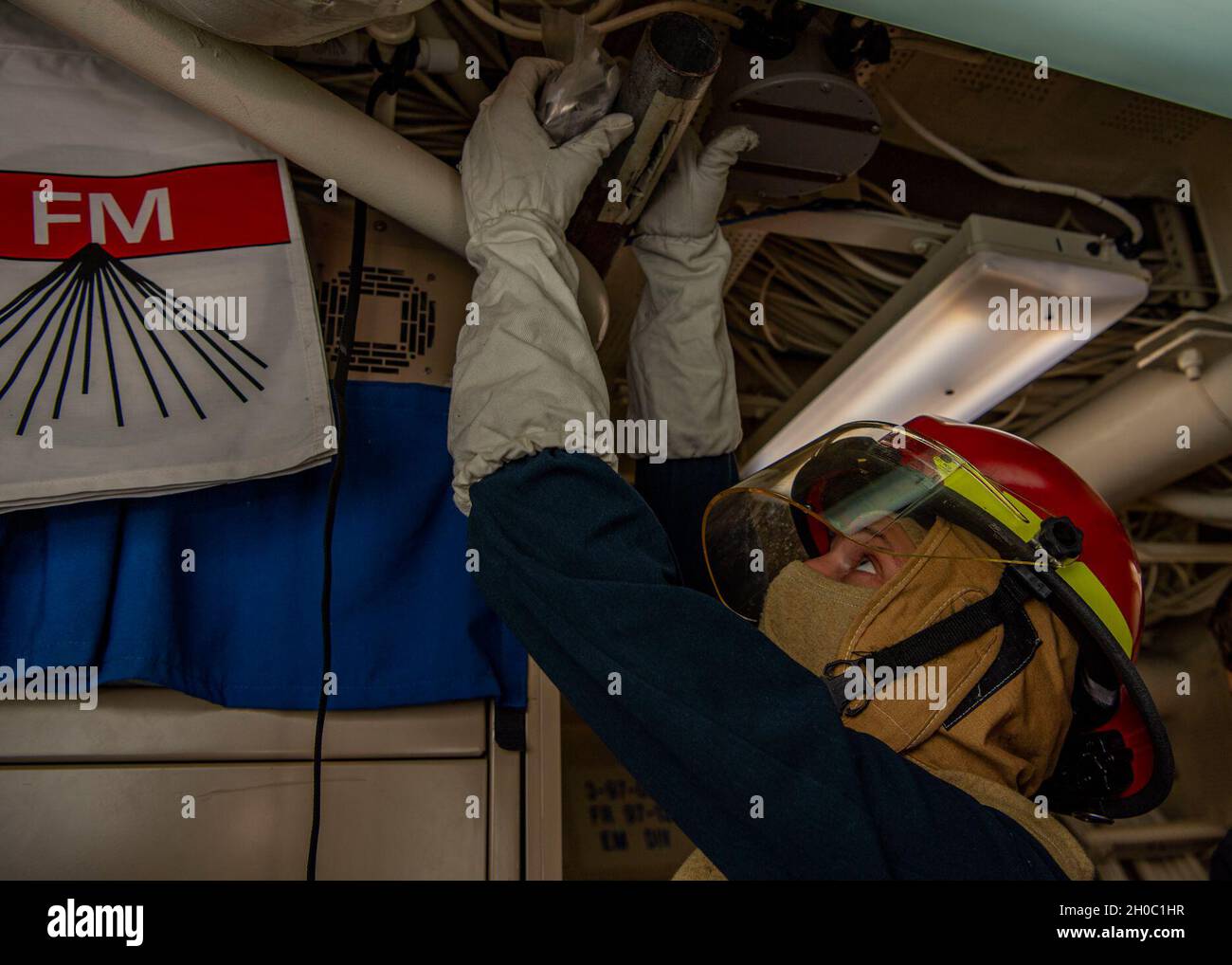 PACIFIC OCEAN (Jan. 21, 2021) U.S. Navy Damage Controlman 3rd Class ...