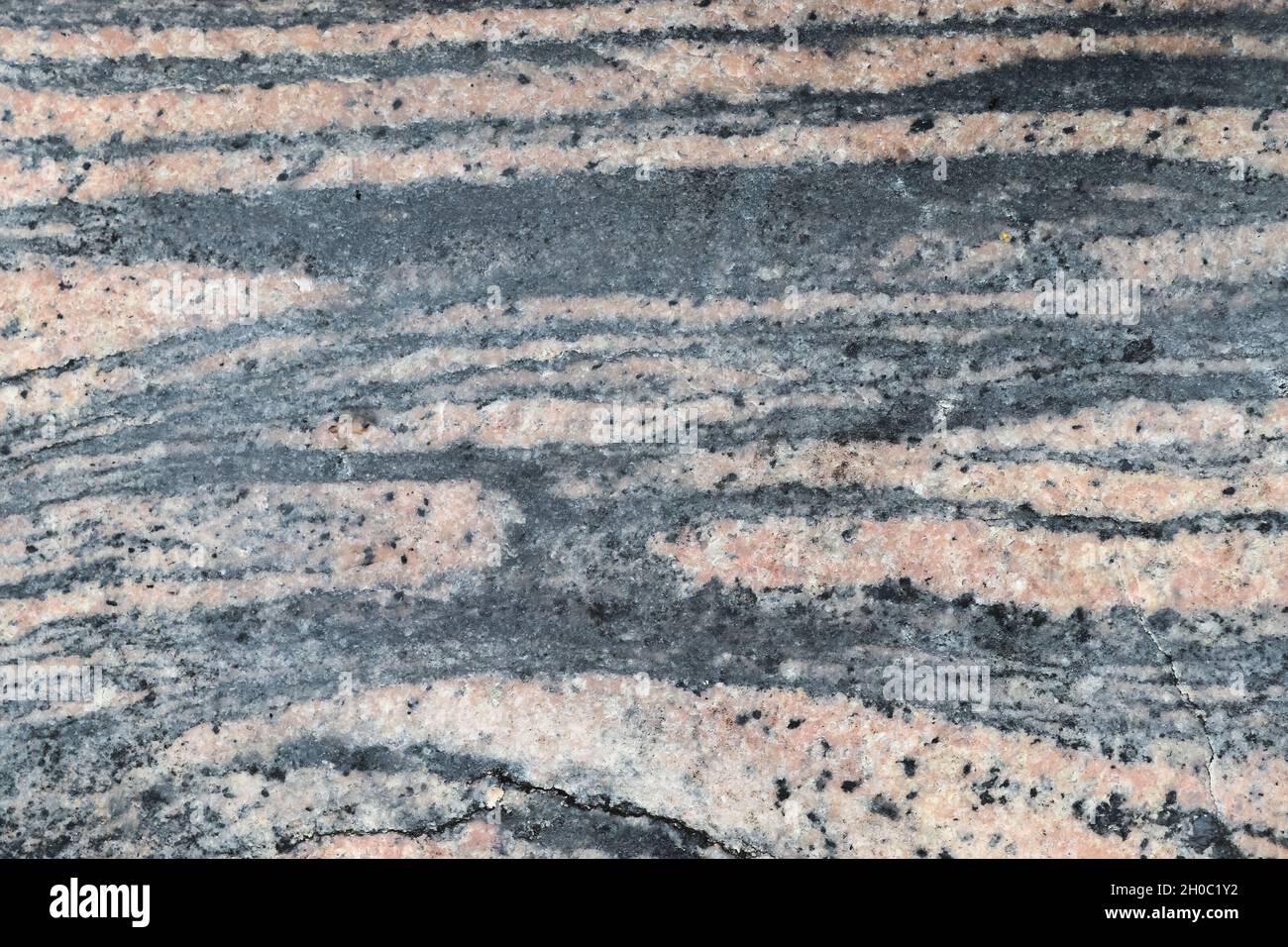 Granite stone wall texture in a detailed close up view in a high ...