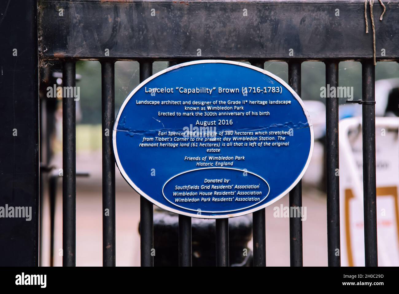 Blue plaque disc to Lancelot Capability Brown at entrance to Wimbledon ...