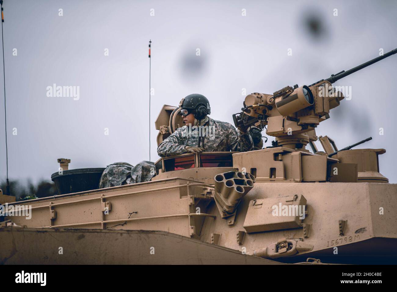 A tank gunner with 1st Battalion, 12th Cavalry Regiment, 3rd Armored ...