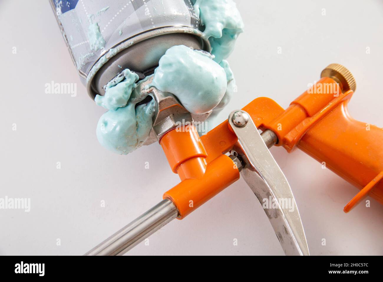 Construction foam gun with a defective cylinder. Foam bottle defect ...