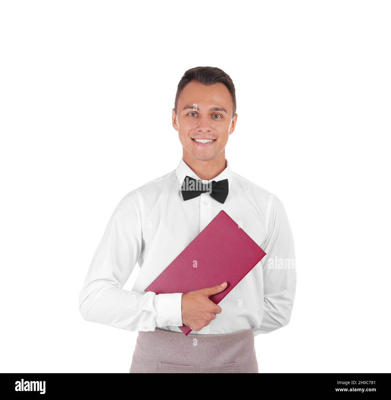 Young waiter with menu on white background Stock Photo - Alamy