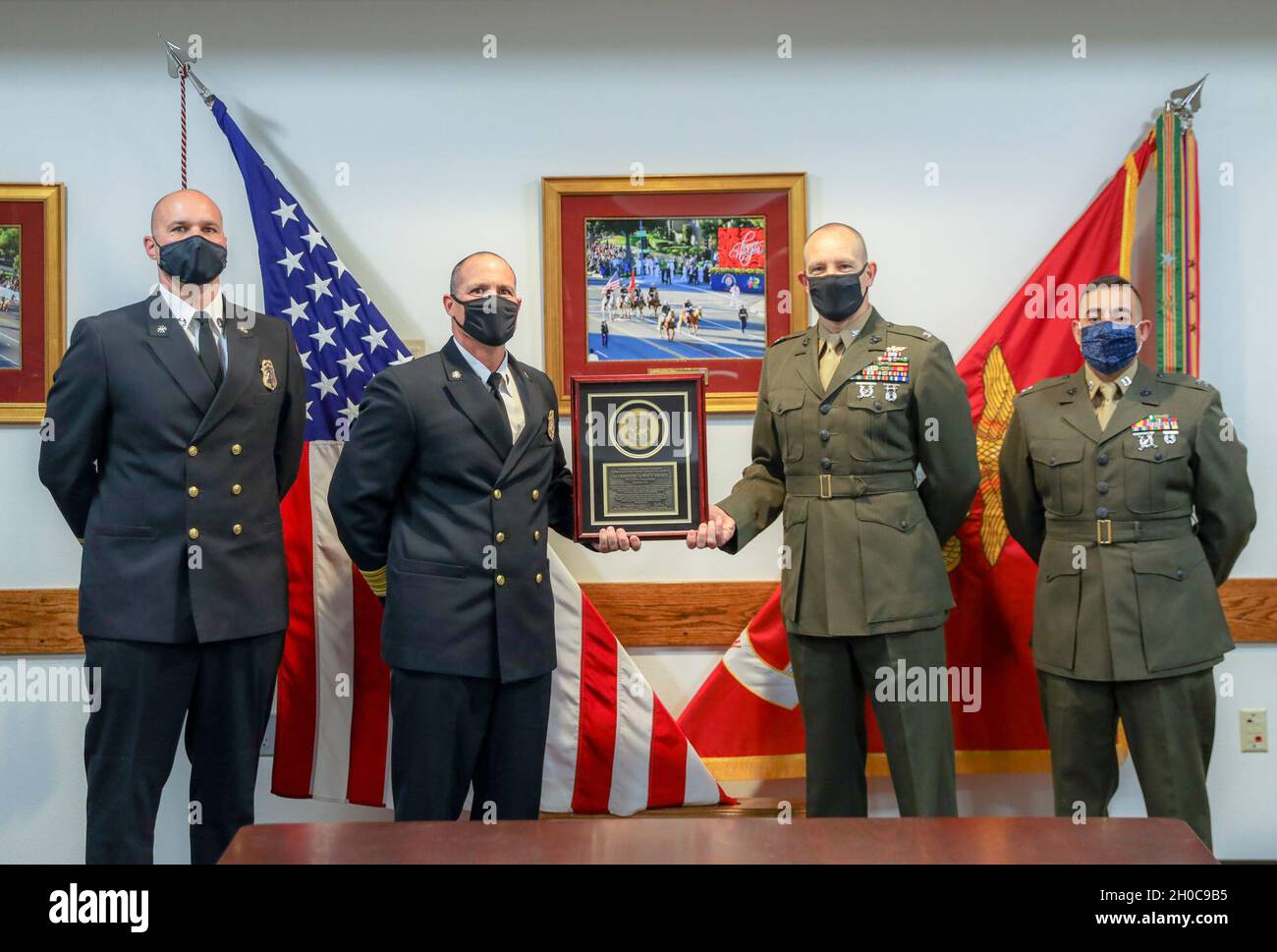 Ryan Tworek, deputy fire chief, Paul Purdy, fire chief, Col. Craig C ...