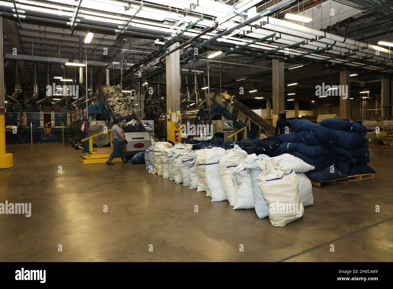 The NEX Great Lakes, Illinois, Laundry Plant installed two new tunnel ...