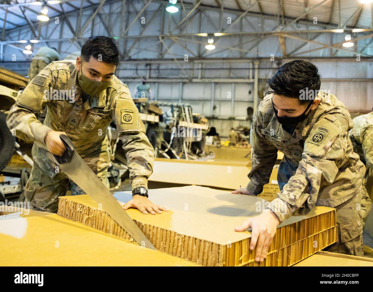 Pfc. Nathan Ramirez, left, and Pfc. Andrew Mercado, right, both ...