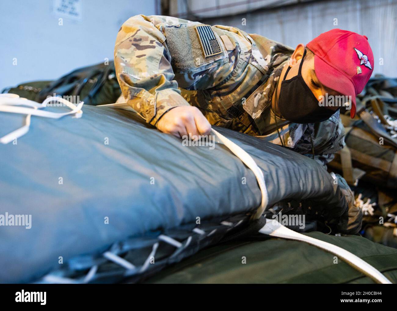 Spc. David Haring, a parachute rigger assigned to 151st Quartermaster ...