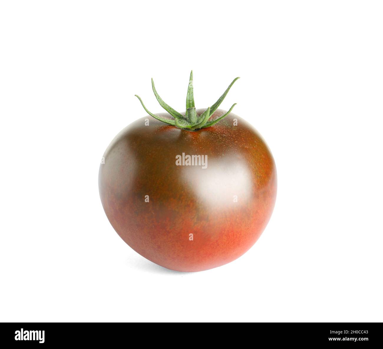 Tasty brown tomato on white background Stock Photo - Alamy