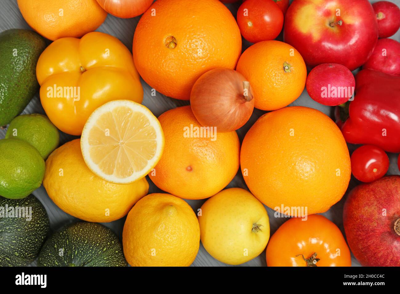 Rainbow collection of ripe fruits and vegetables as background, top ...