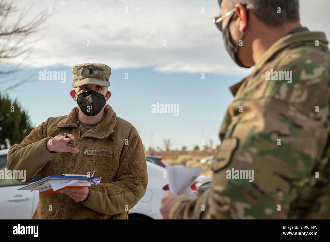 1st Lt. Eric Lawson, 412th Test Wing, monitors the COVID-19 vaccination ...