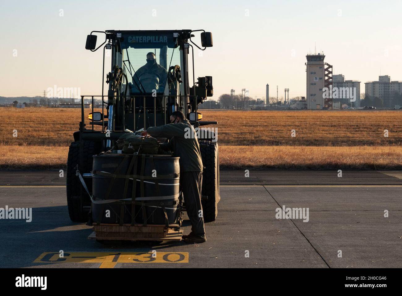 Tech. Sgt. Brian Gates, 36th Airlift Squadron loadmaster, checks ...