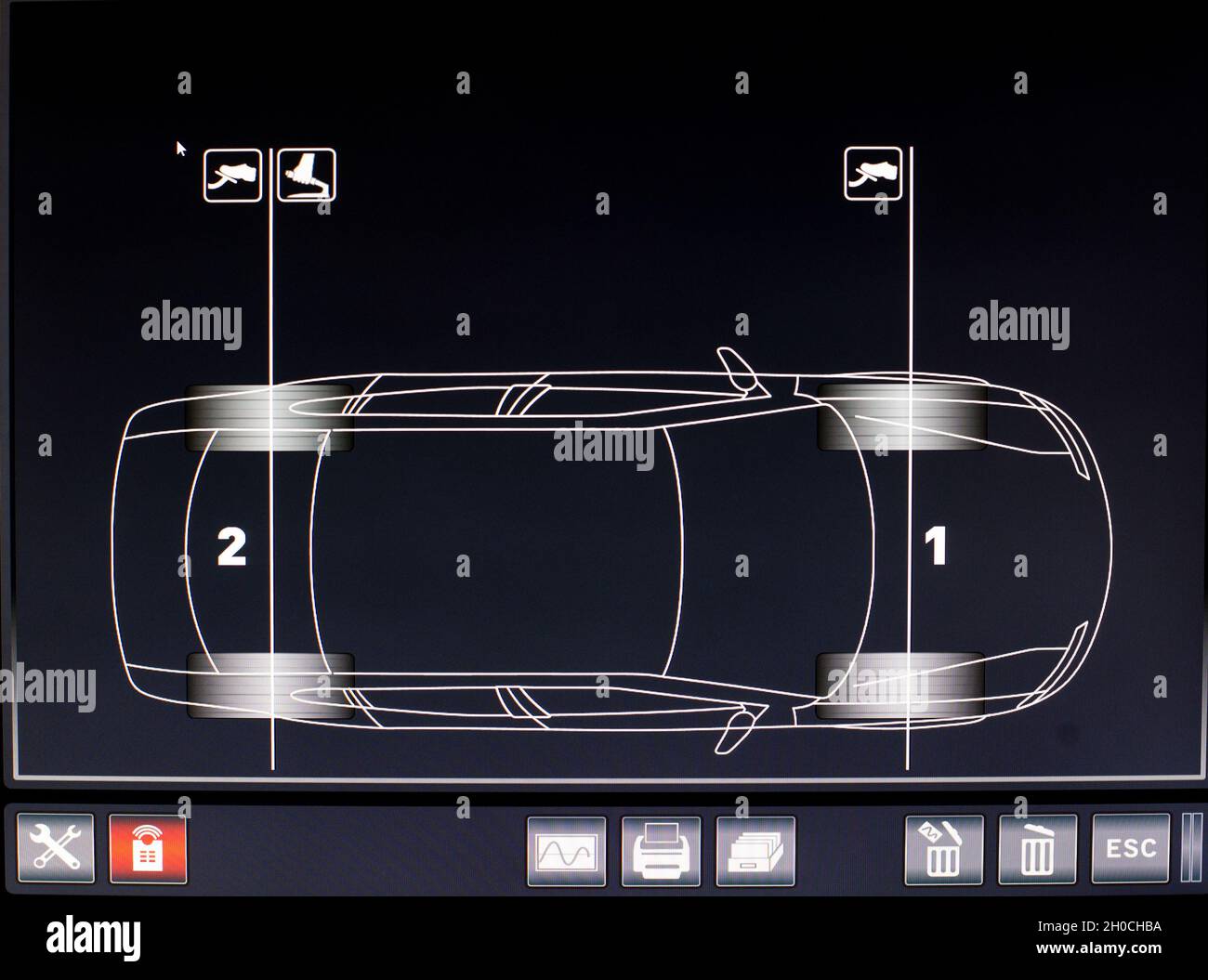 Display of modern device for wheel balancing Stock Photo - Alamy