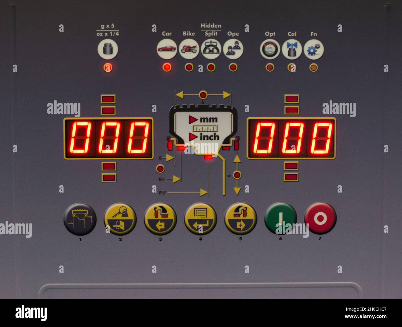 Display of modern device for wheel balancing Stock Photo - Alamy