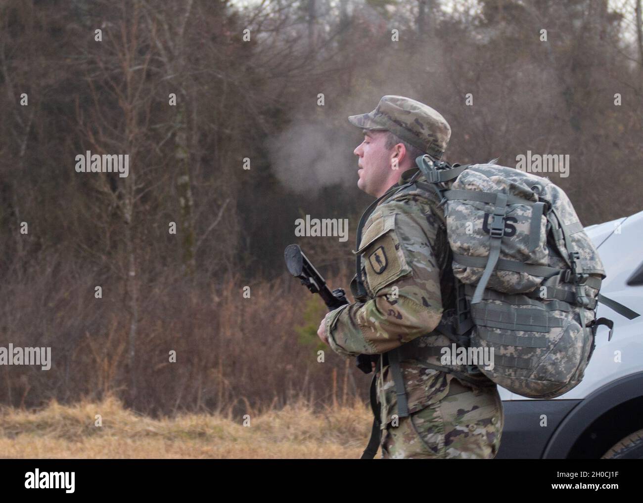 Sgt. 1st Class Sean Griffin reaches the five mile turnaround point on ...