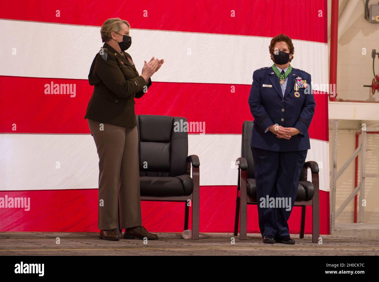 HUSTON, Texas — Maj. Gen. Tracey R. Norris (left) congratulates Maj ...