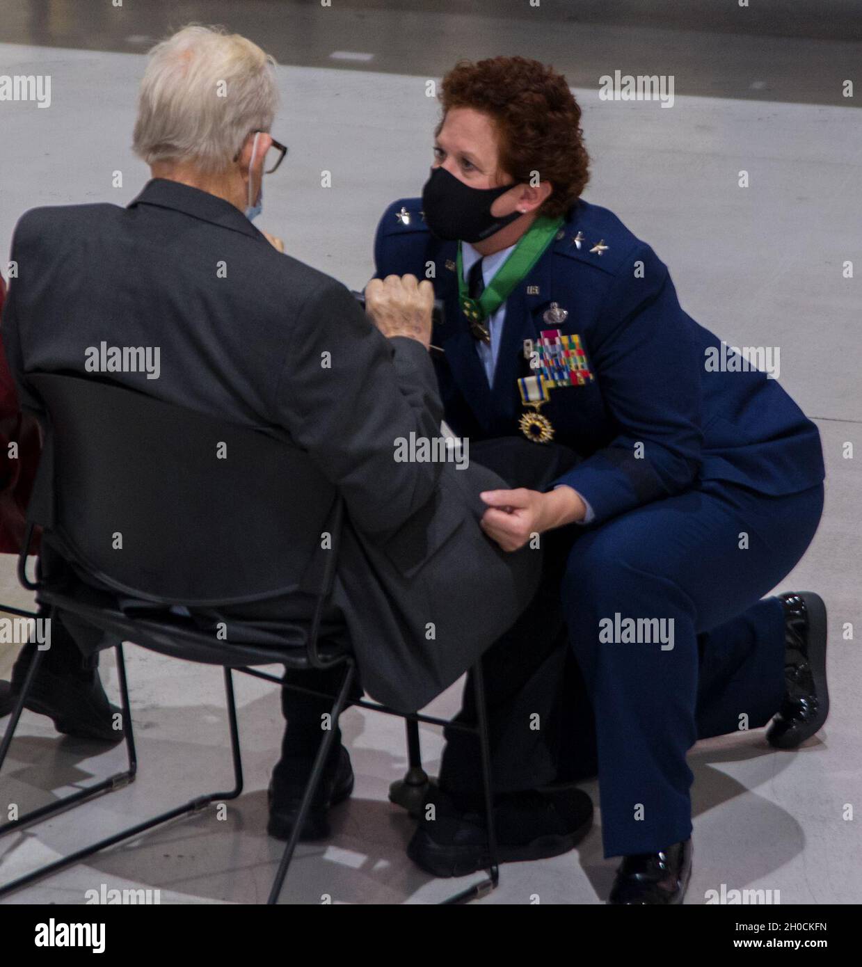 Maj. Gen. Dawn M. Ferrell shares a private moment with her father ...