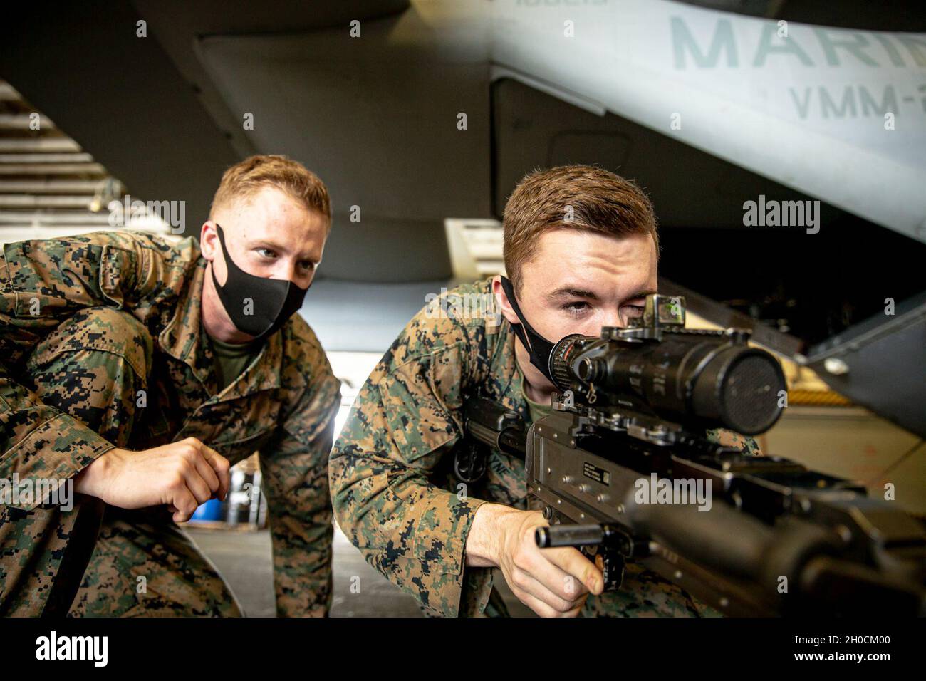 U.S. Marine Lance Cpl. Benjamin Brady, left, a machine gunner and a ...