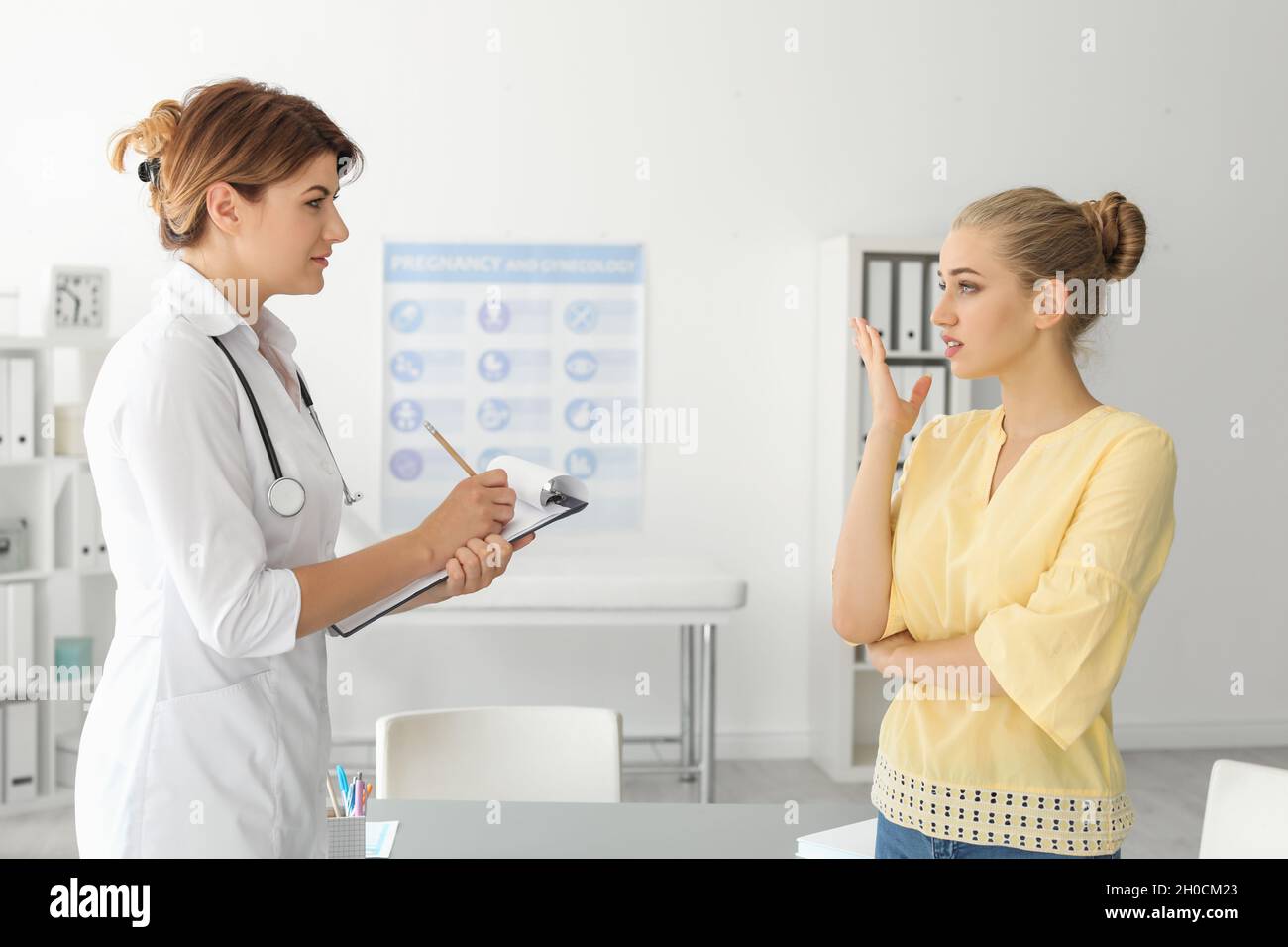 Patient having appointment with doctor in hospital Stock Photo - Alamy