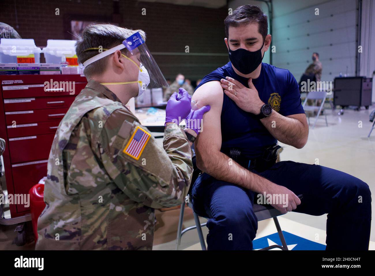 Alaska Army National Guard Spc. Alexander Martin-Frank, a combat medic ...