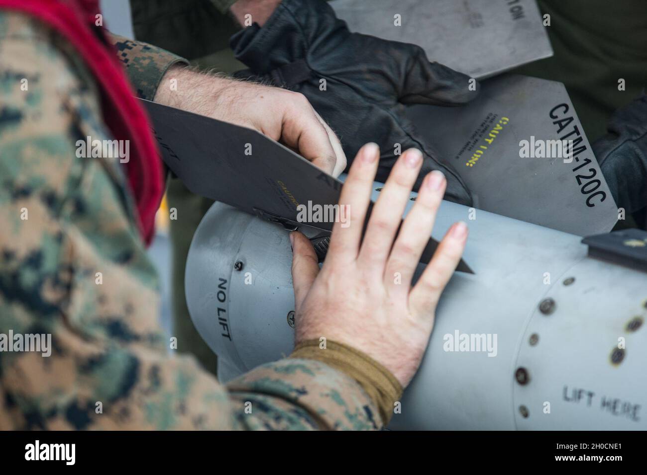A Marine with Marine Medium Tiltrotor Squadron 262 (Reinforced), 31st ...