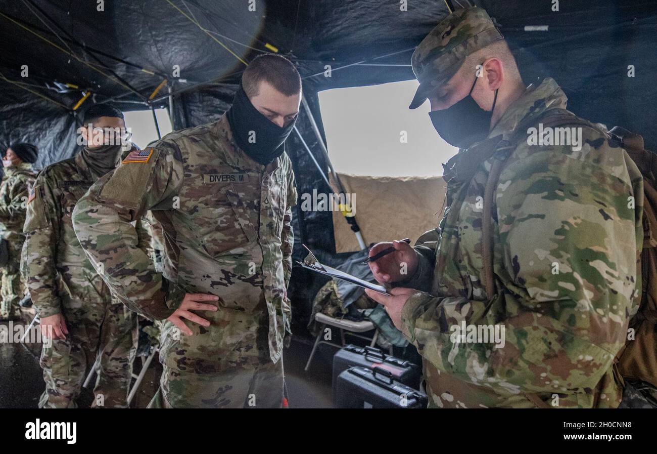 The soldiers in Defense CBRN Response Force (DCRF) Task Force 1 mimic ...