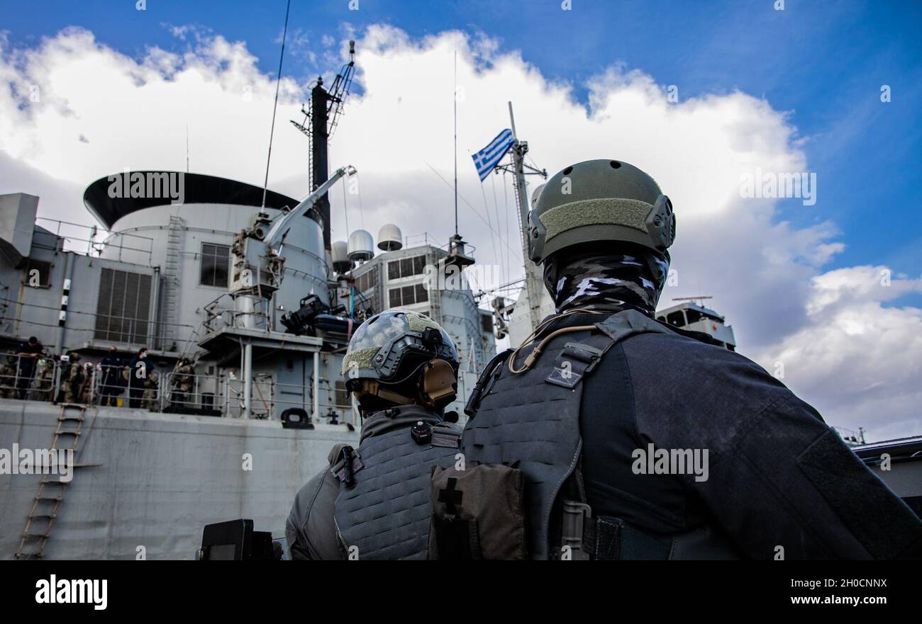 U.S. Navy Special Warfare Combatant-Craft Crewmen (SWCC) approach the ...