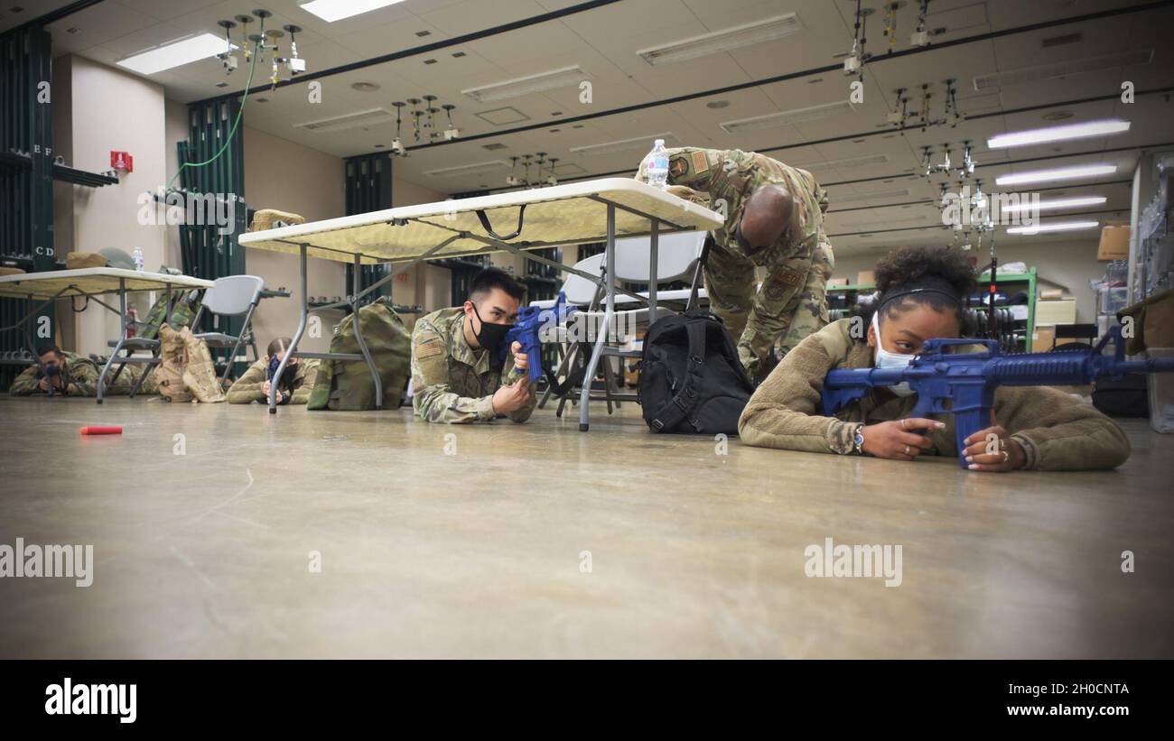 Airmen assigned to the 35th Medical Group engage in a Care Under Fire ...