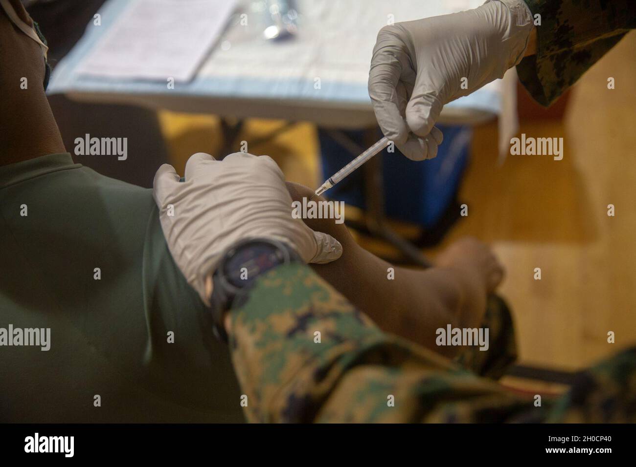 U.S. Navy Petty Officer Third Class Brennan Phillips, a hospital ...