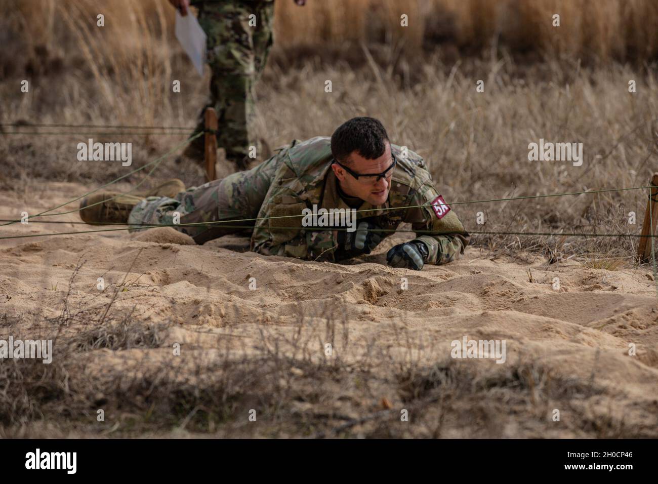 U.S. Army Capt. Joseph Boyd, assigned to the 30th Medical Brigade, low ...