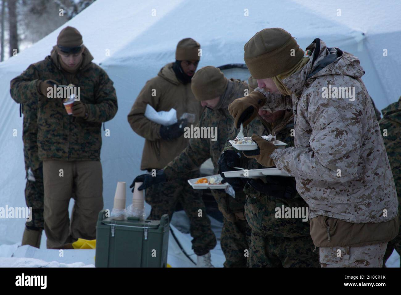 U.S. Marines with 2nd Maintenance Battalion eat field chow at the ...