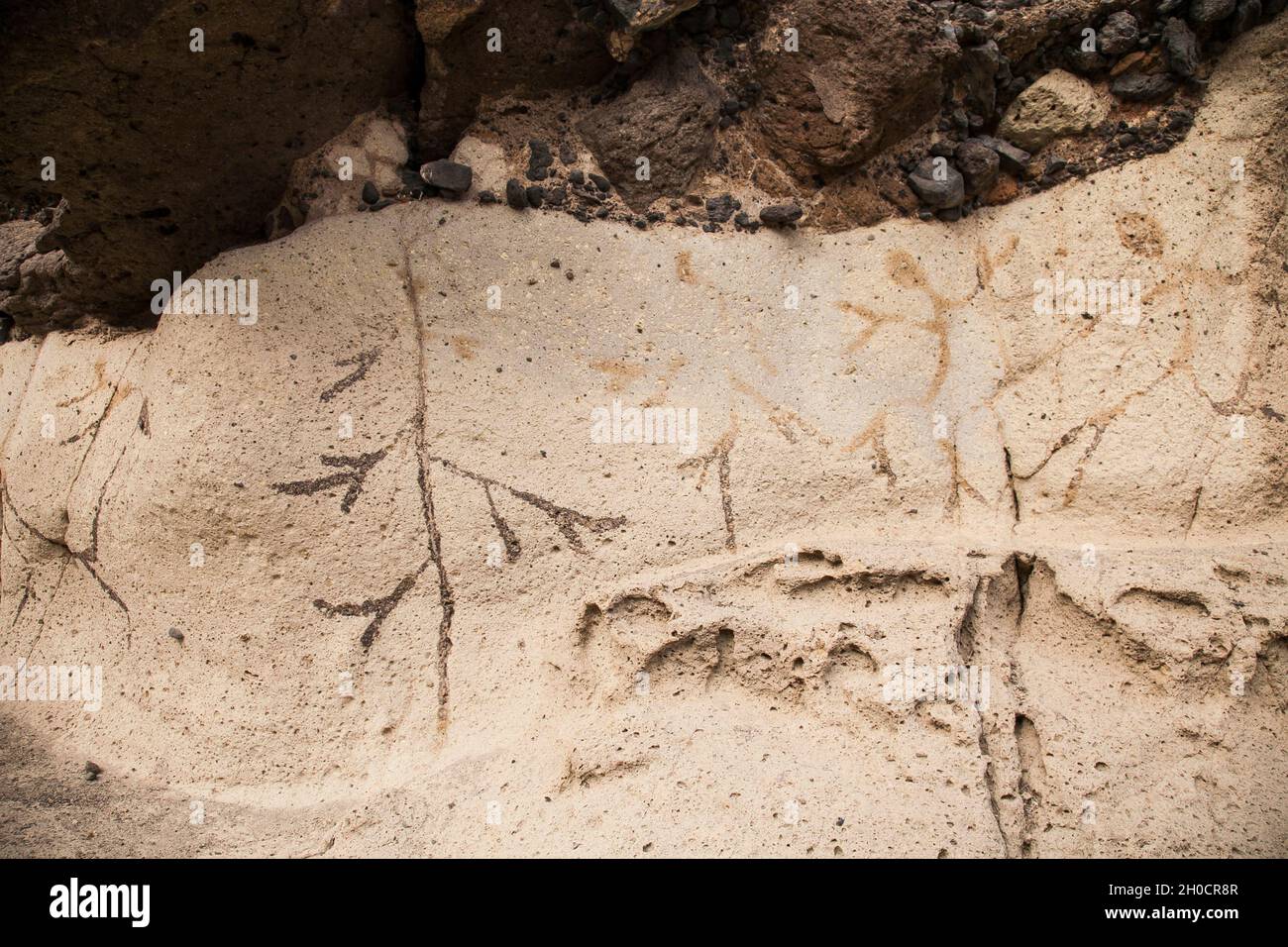 Wall cave with drawings of the primitive person - collage Stock Photo ...