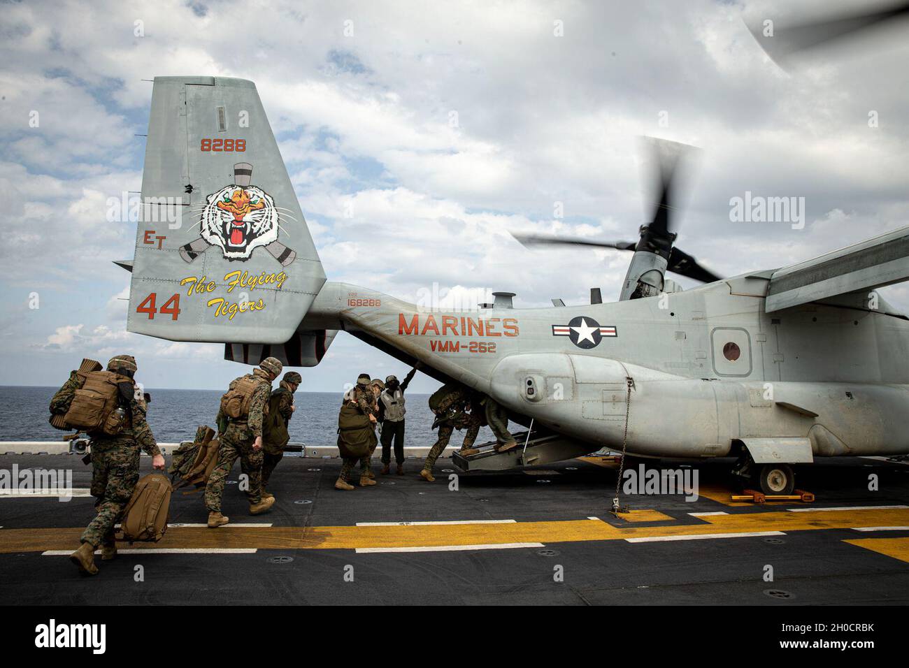 U.S. Marines with the 31st Marine Expeditionary Unit (MEU) board an MV ...