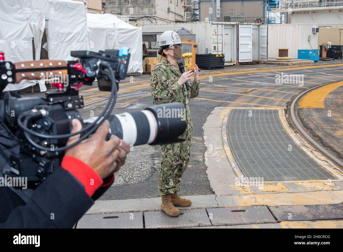 Visual Information Specialist Greg Boyd captures footage as Capt ...