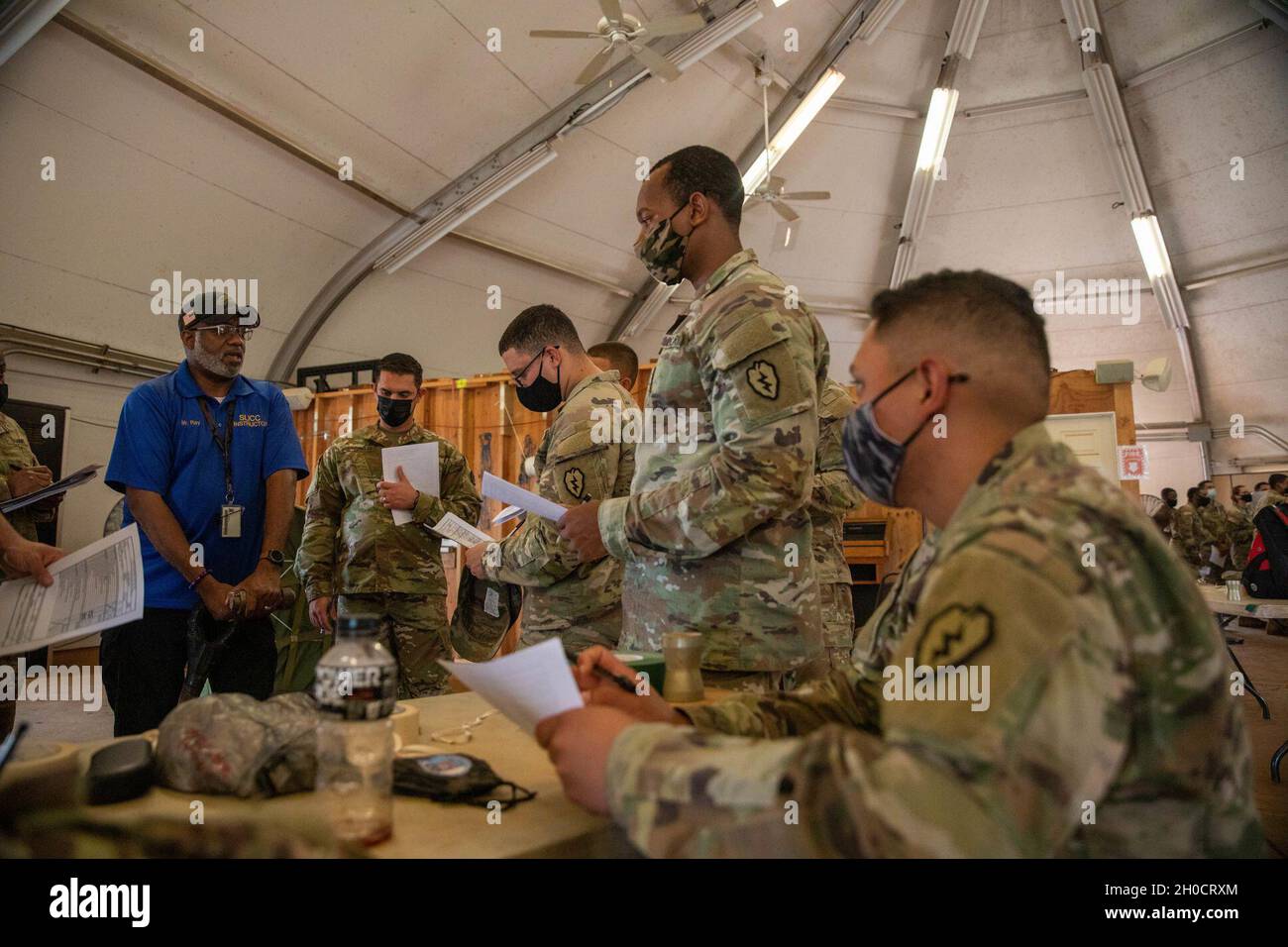 Corporal Michael Toms (center), an Auto Logistics Specialist with ...
