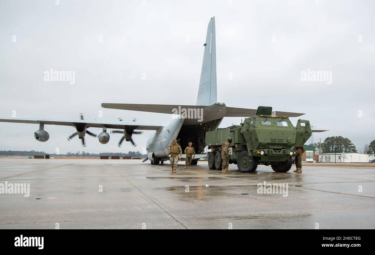 U.S. Marines conduct checks on a M142 High Mobility Artillery Rocket ...