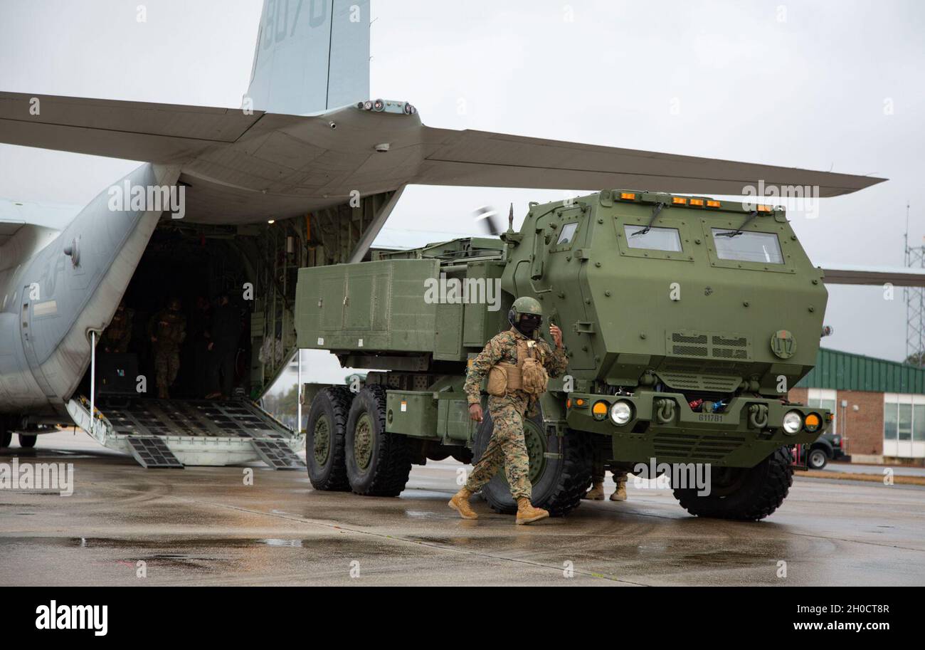 U.S. Marines conduct checks on a M142 High Mobility Artillery Rocket ...