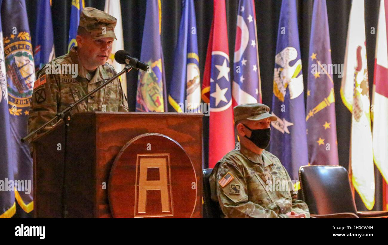 Command Sgt. Maj. Raymond J. Ramirez, accepts the colors from Col ...
