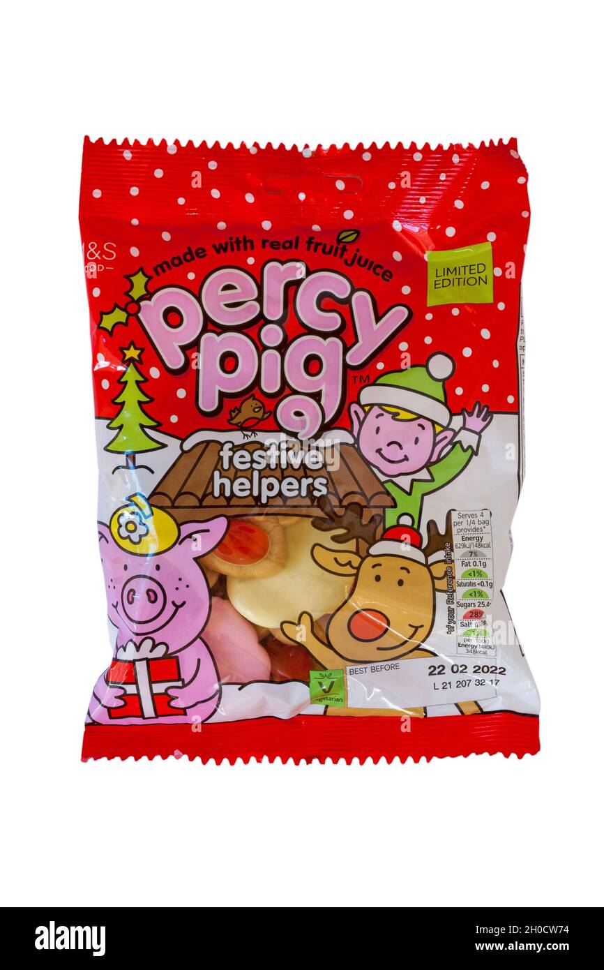 Bag of M&S Percy Pig Festive Helpers sweets made with real fruit juice isolated on white ...