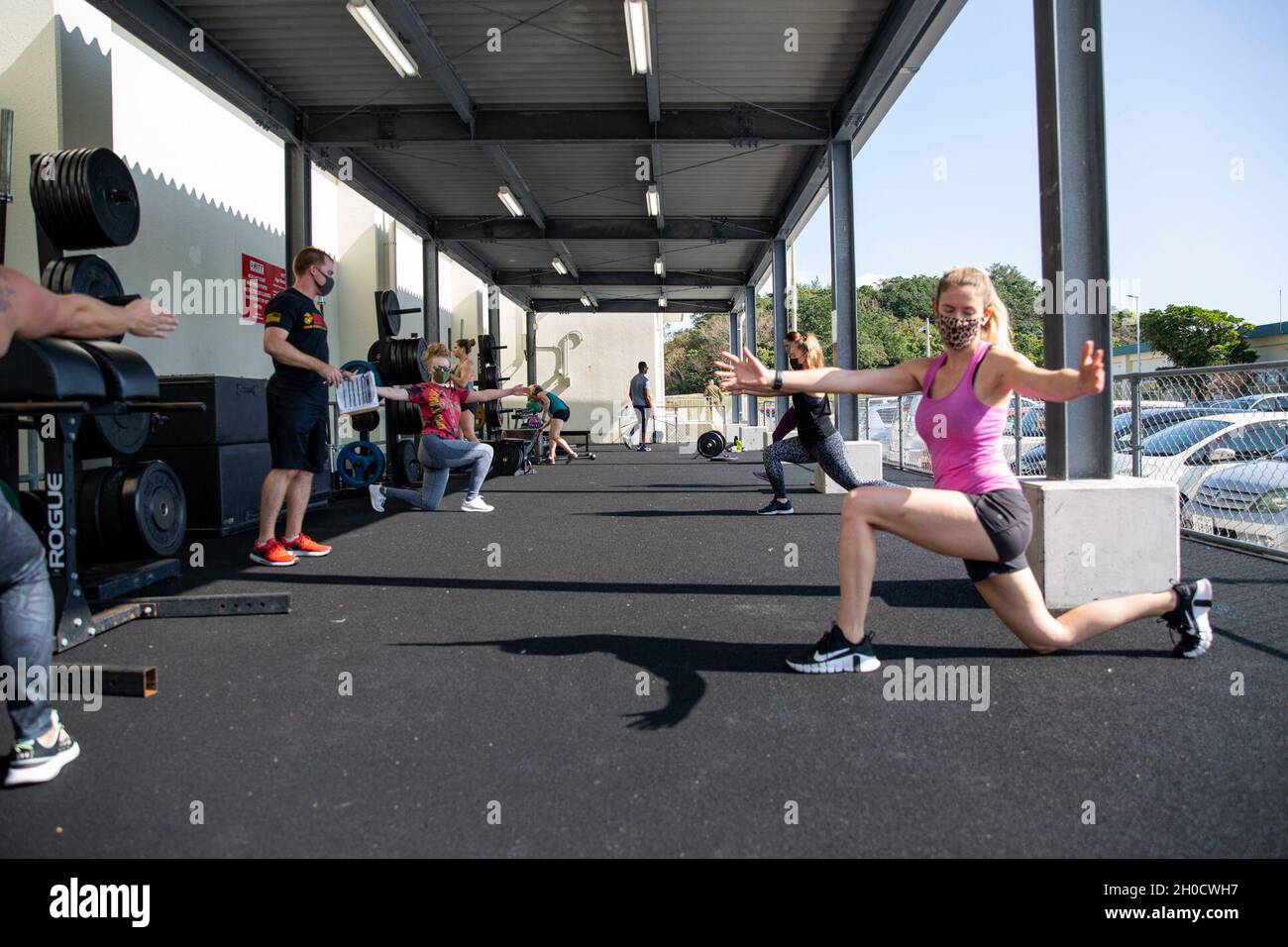 U.S. Marines and civilians with III Marine Expeditionary Force conduct ...