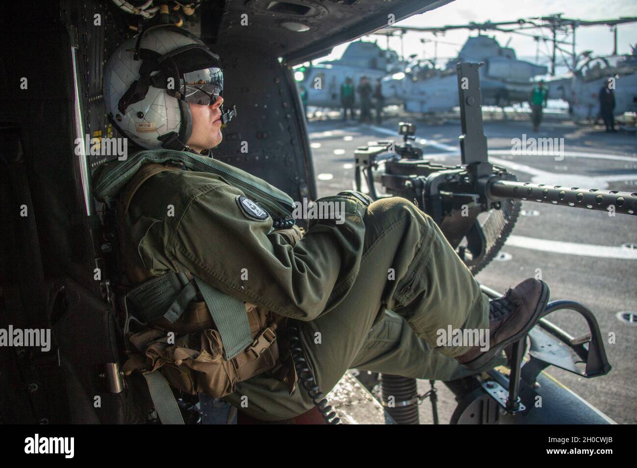 A U.S. Marine crew chief with Marine Medium Tiltrotor Squadron 262 ...