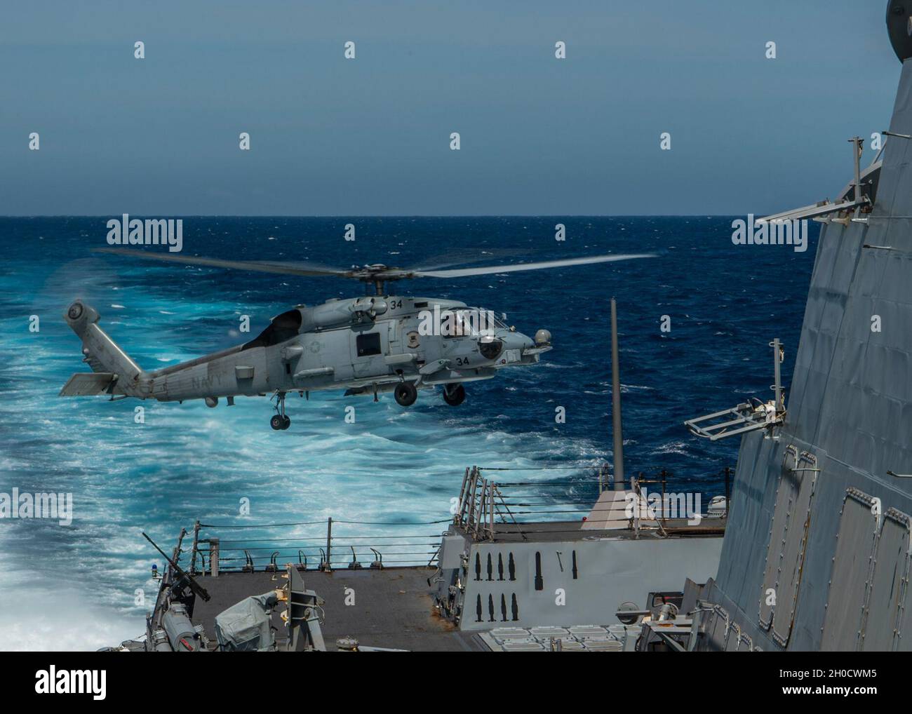 PACIFIC OCEAN (Jan. 26, 2021) An MH-60R Sea Hawk, assigned to the ...