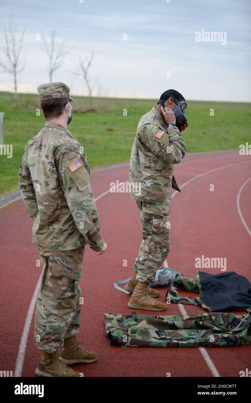 U.S. Army U.S. Army Staff Sgt. Andrew Dobos, checks as Pfc. Arnando ...